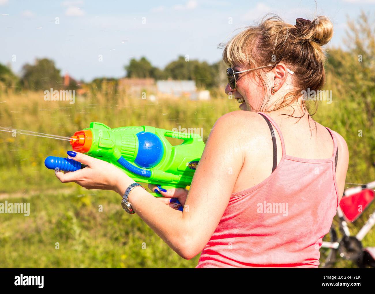 Children playing Water battle, water game battle Stock Photo - Alamy