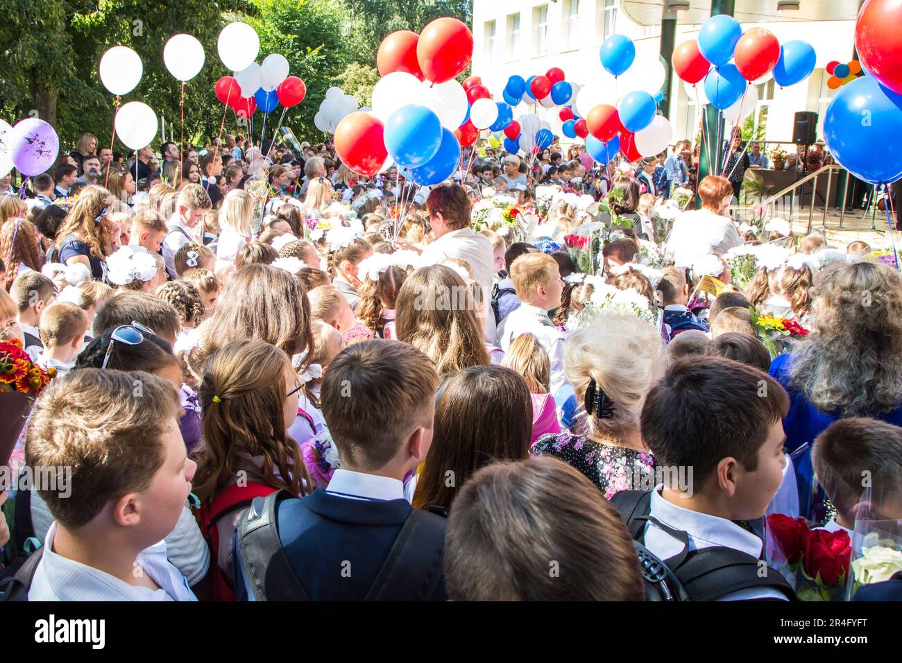 Meeting with the first-grade pupils and teacher at schoolyard. The day ...