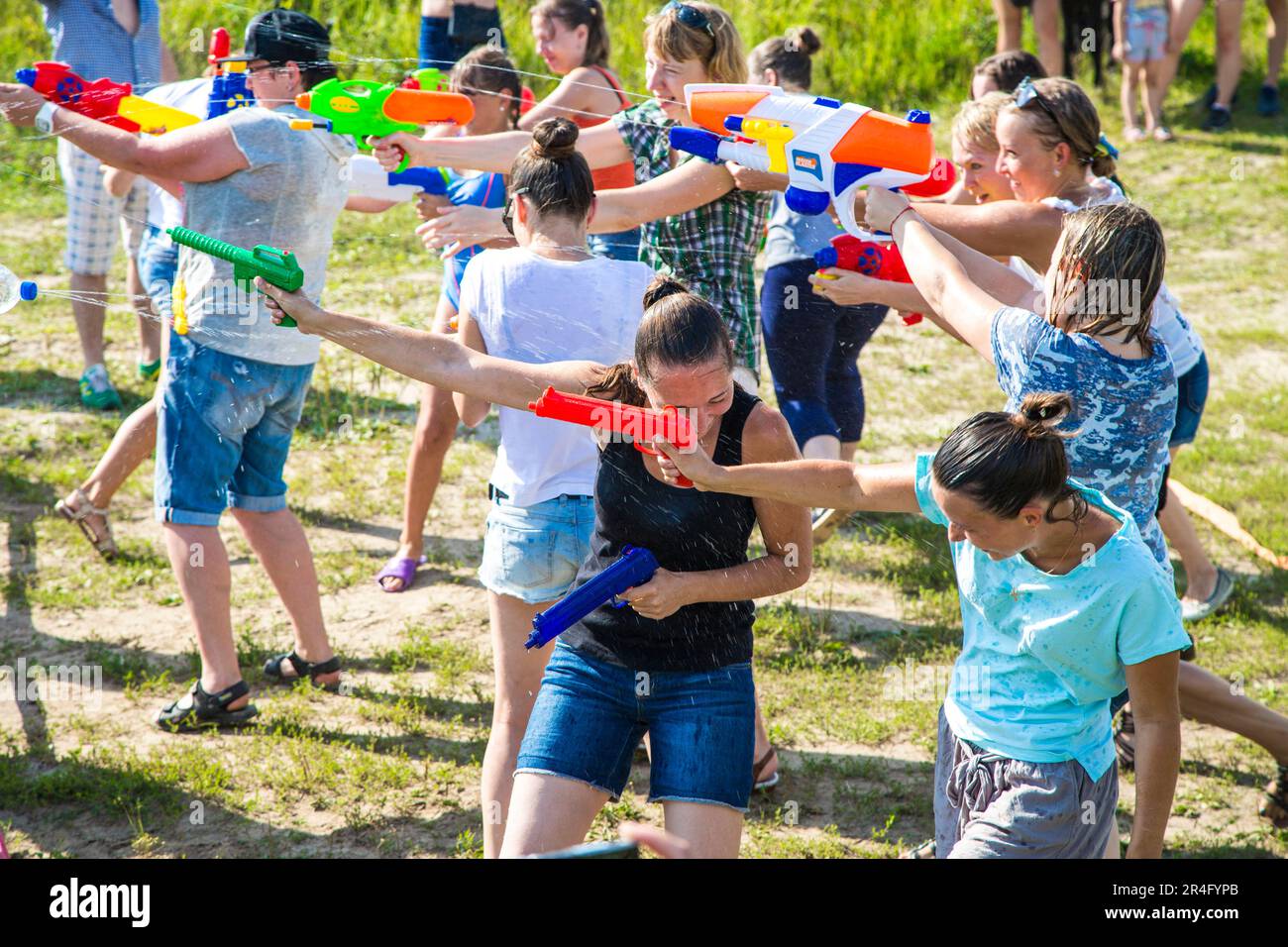 Children playing Water battle, water game battle Stock Photo - Alamy