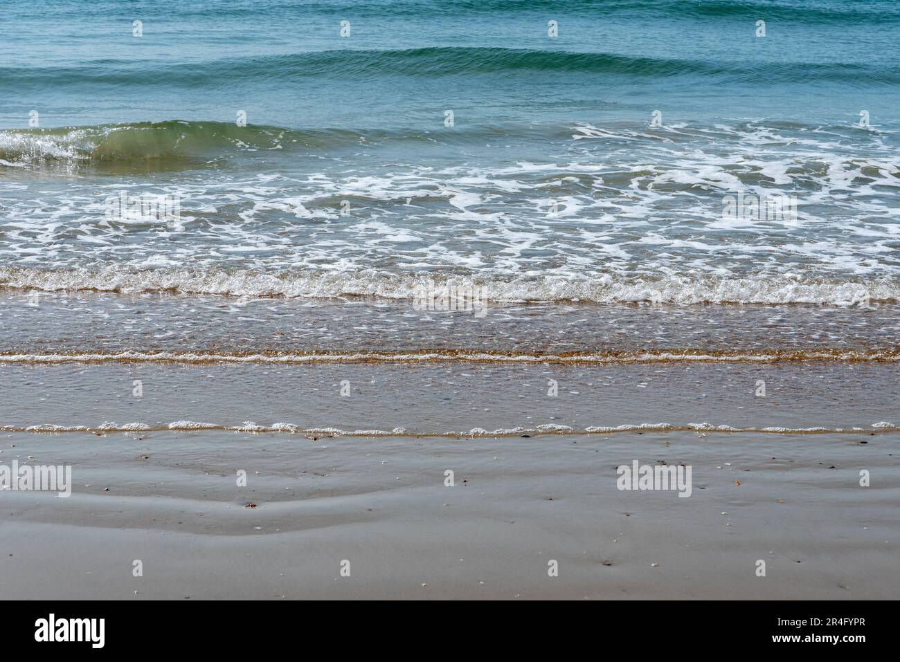 Beautiful gentle waves on shore hi-res stock photography and images - Alamy