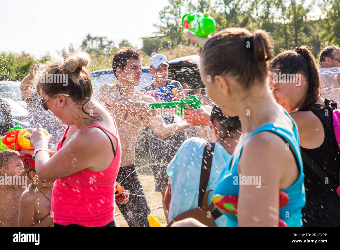 Children playing Water battle, water game battle Stock Photo - Alamy