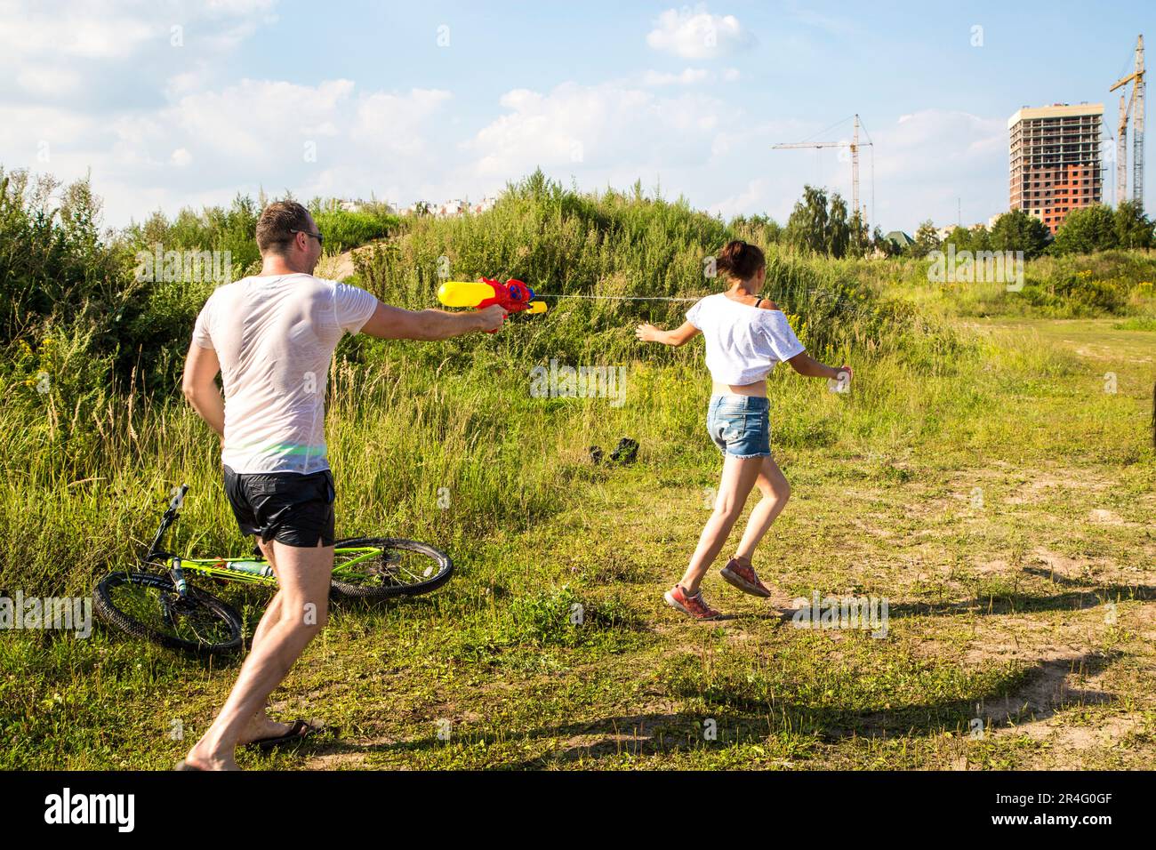 Children playing Water battle, water game battle Stock Photo - Alamy