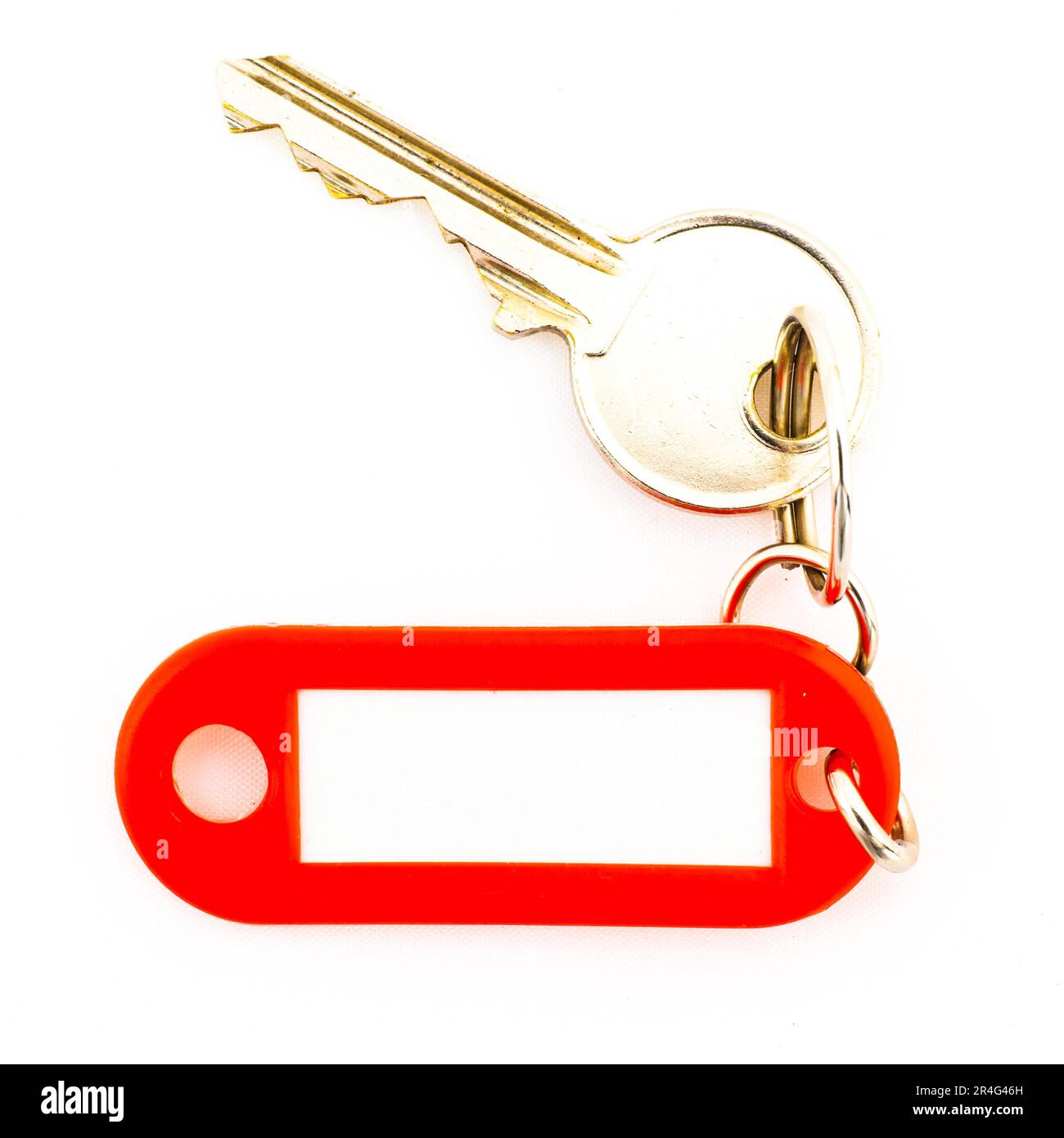 Key with a blank tag, isolate on white background. Add your text on the ...