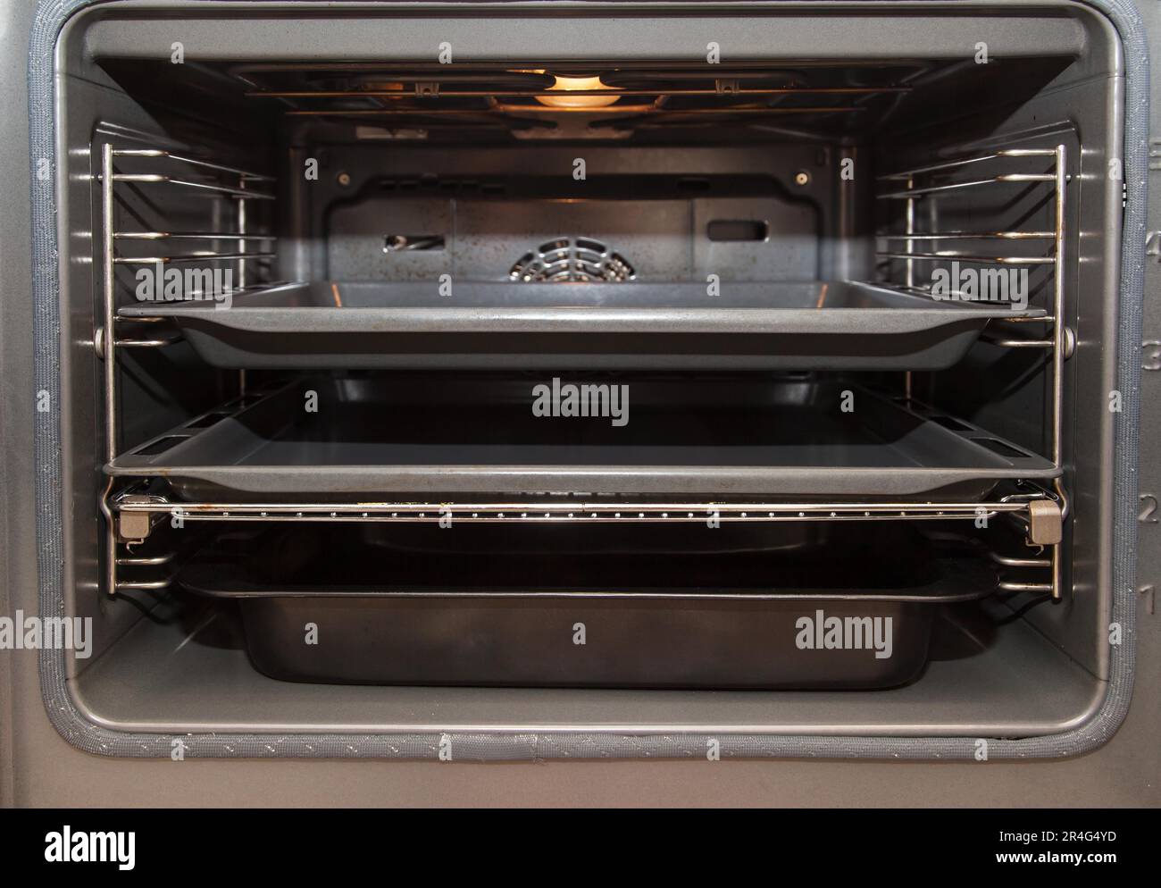 Modern oven with tray inside Stock Photo - Alamy