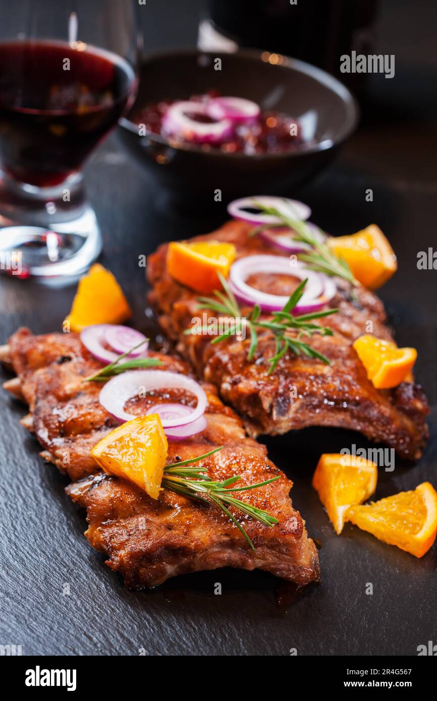 BBQ spare ribs marinated in orange sauce with herbs and wine Stock ...