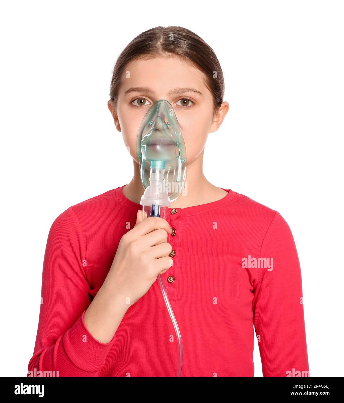 Cute girl using nebulizer for inhalation on white background Stock ...