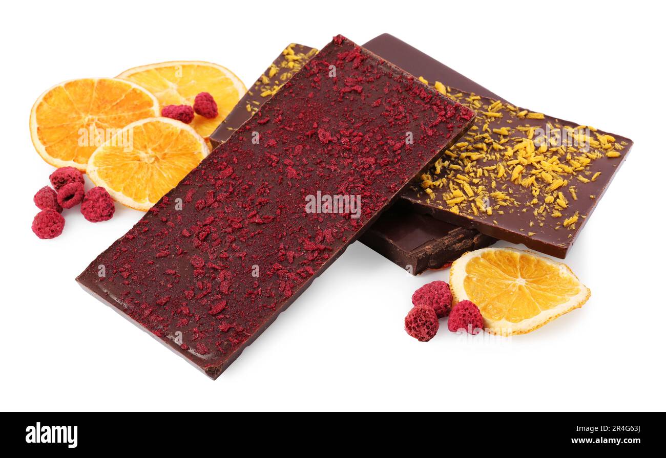Chocolate bars with freeze dried fruits, raspberries and orange slices ...