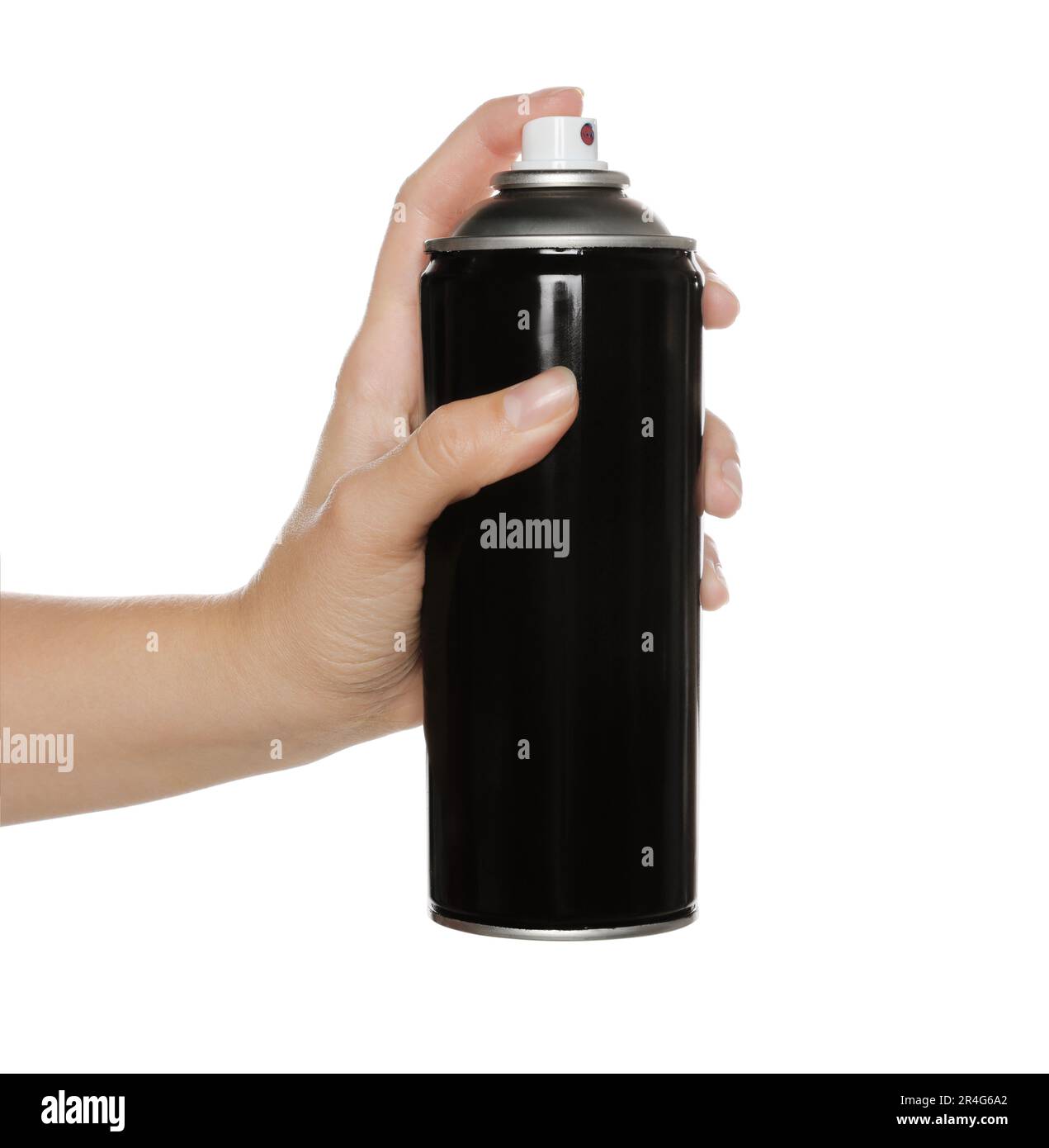 Woman holding black can of spray paint on white background, closeup ...