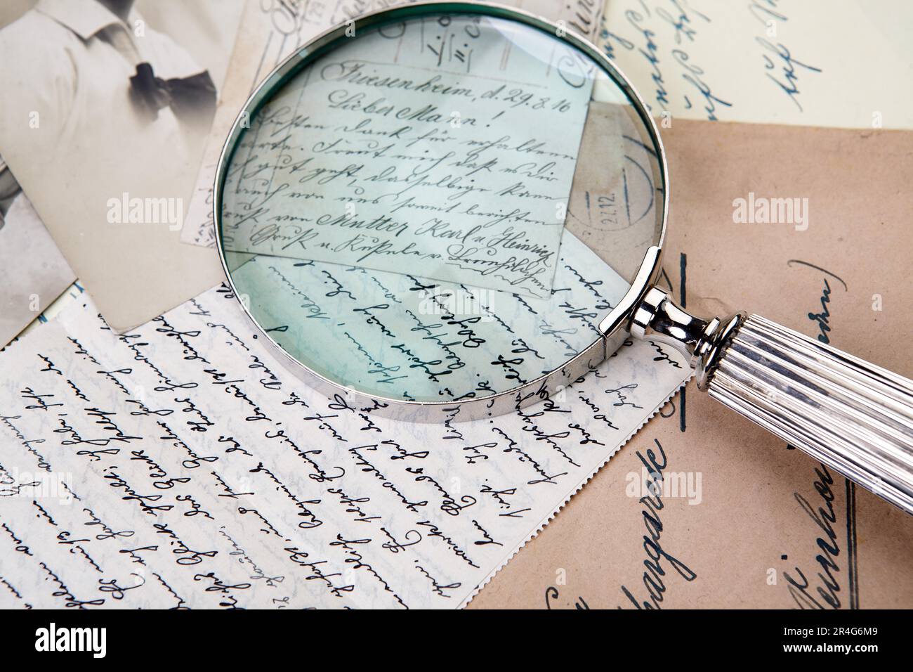 Old hand magnifier with handwritten letters Stock Photo - Alamy
