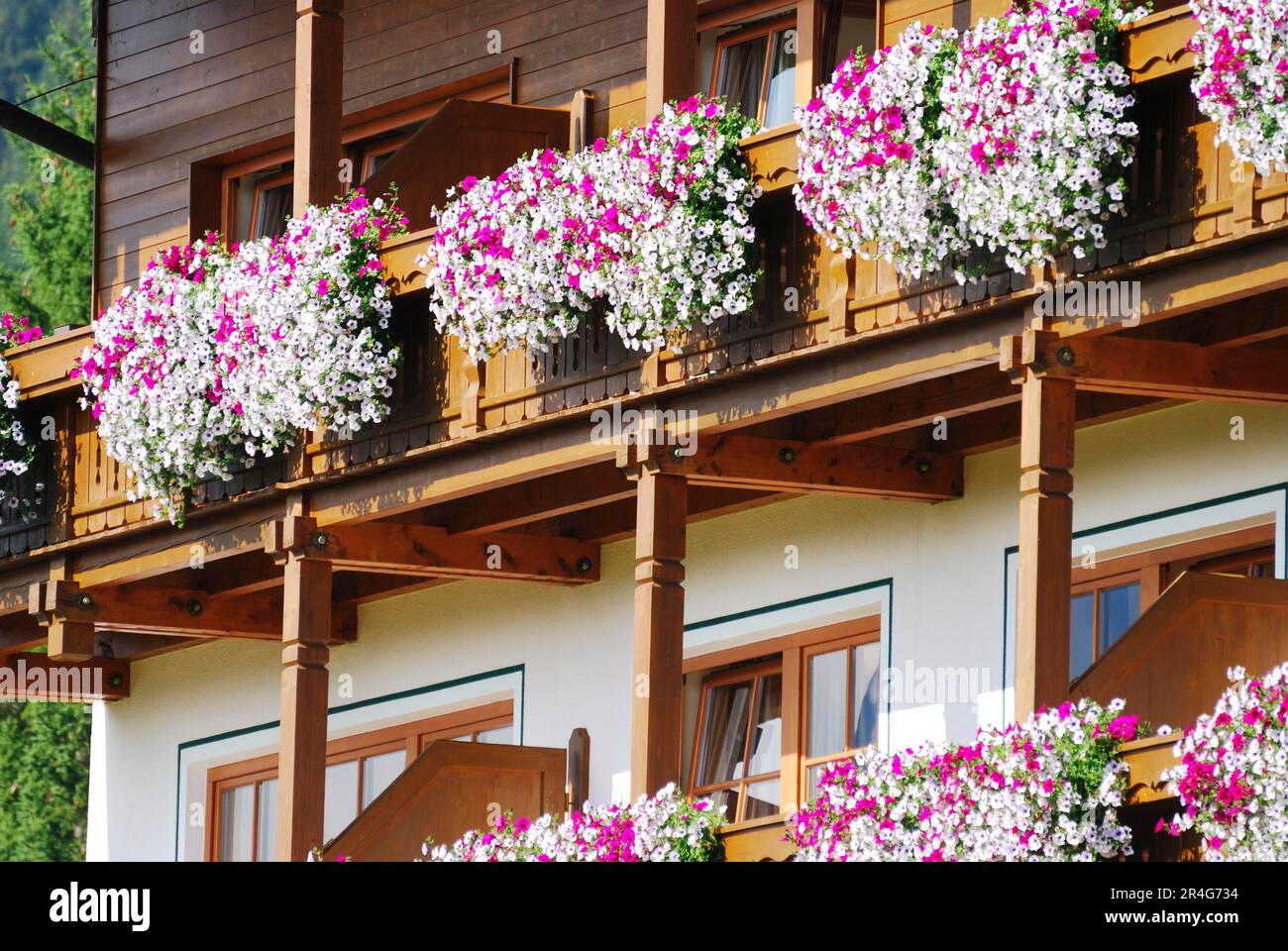 Balcony at a hotel full of flowers Stock Photo - Alamy