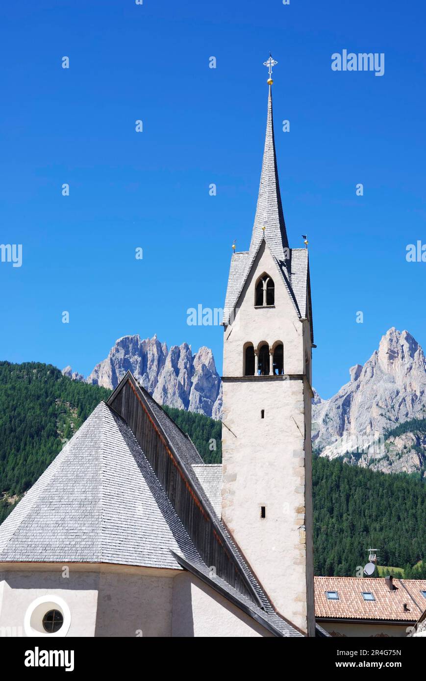 Alpine church in Pozza di Fassa Italy Stock Photo - Alamy