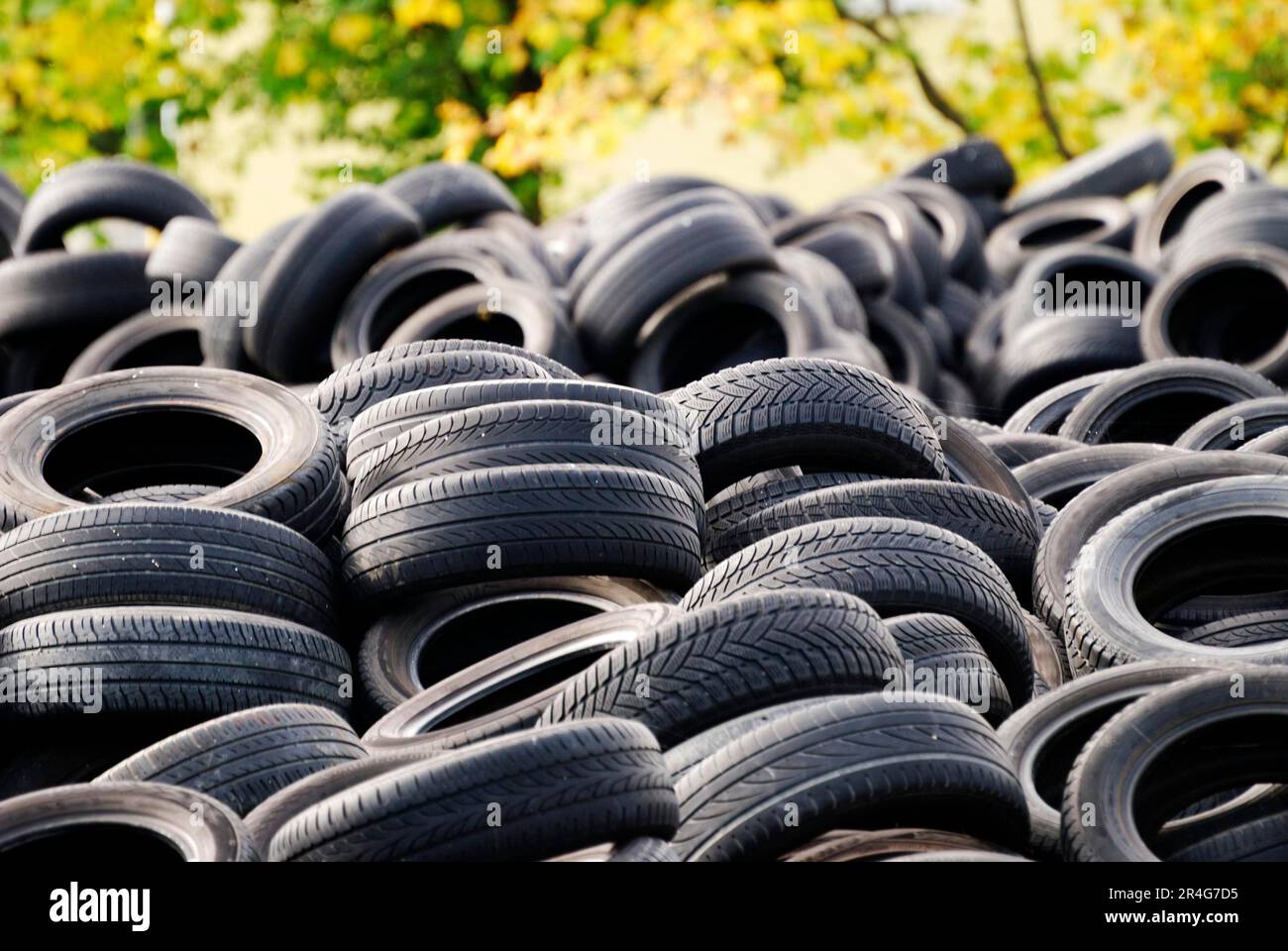A waste heap of old tyres for rubber recycling Stock Photo - Alamy