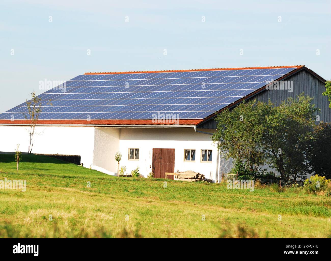 Green renewable energy with photovoltaic installations on the roof ...