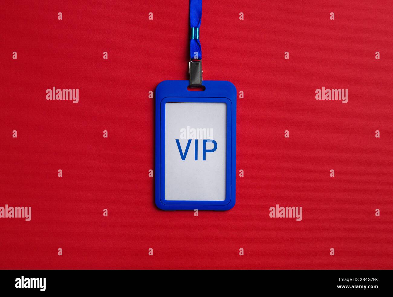 Plastic vip badge on red background, top view Stock Photo - Alamy