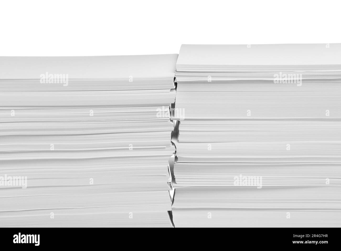Stacks of paper sheets on white background Stock Photo - Alamy