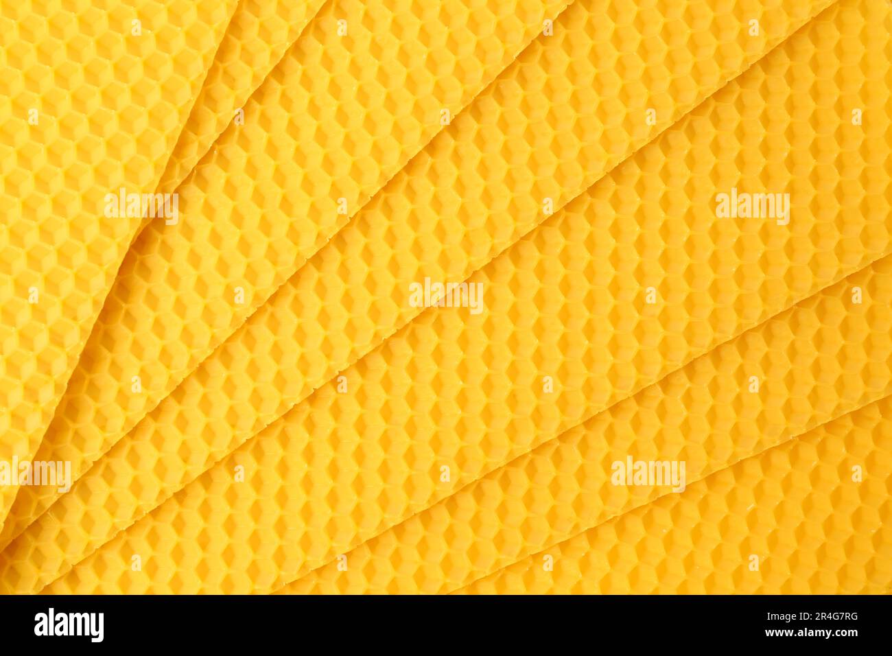 Natural beeswax sheets as background, top view Stock Photo - Alamy
