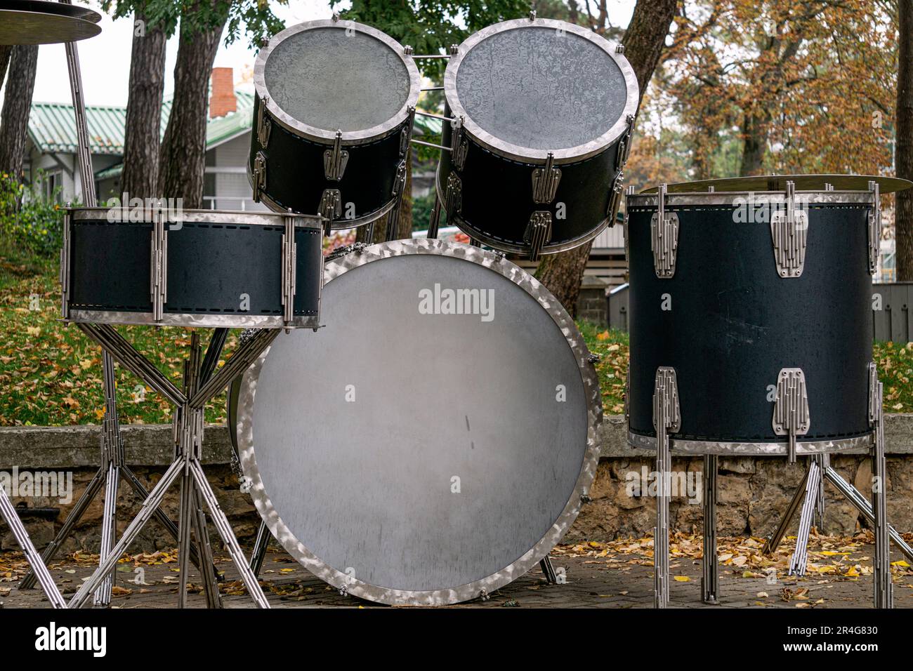 Drum set. Percussion musical instruments on a city street close-up ...