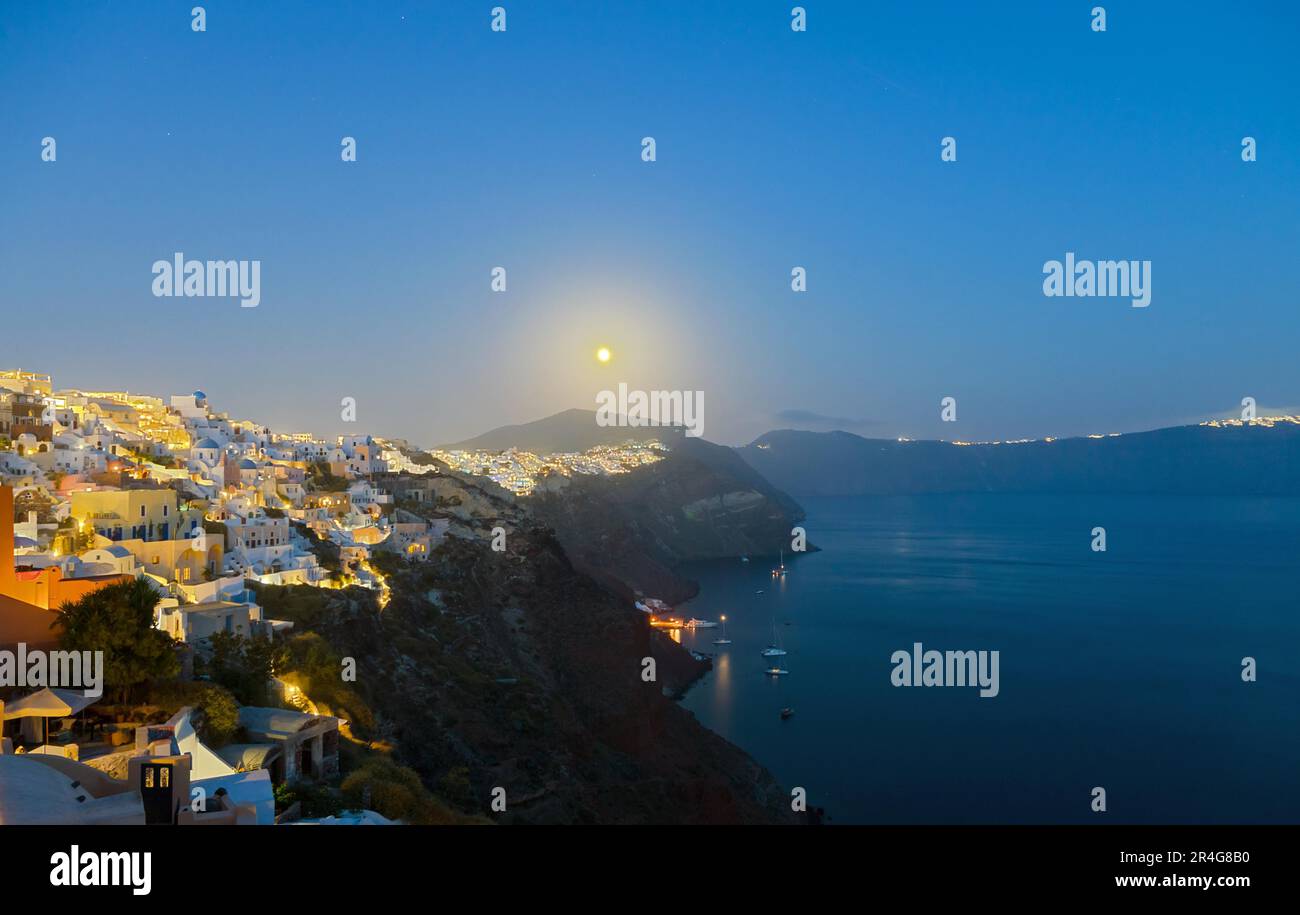 Full moon over Oia on Santorini, Greece Stock Photo - Alamy