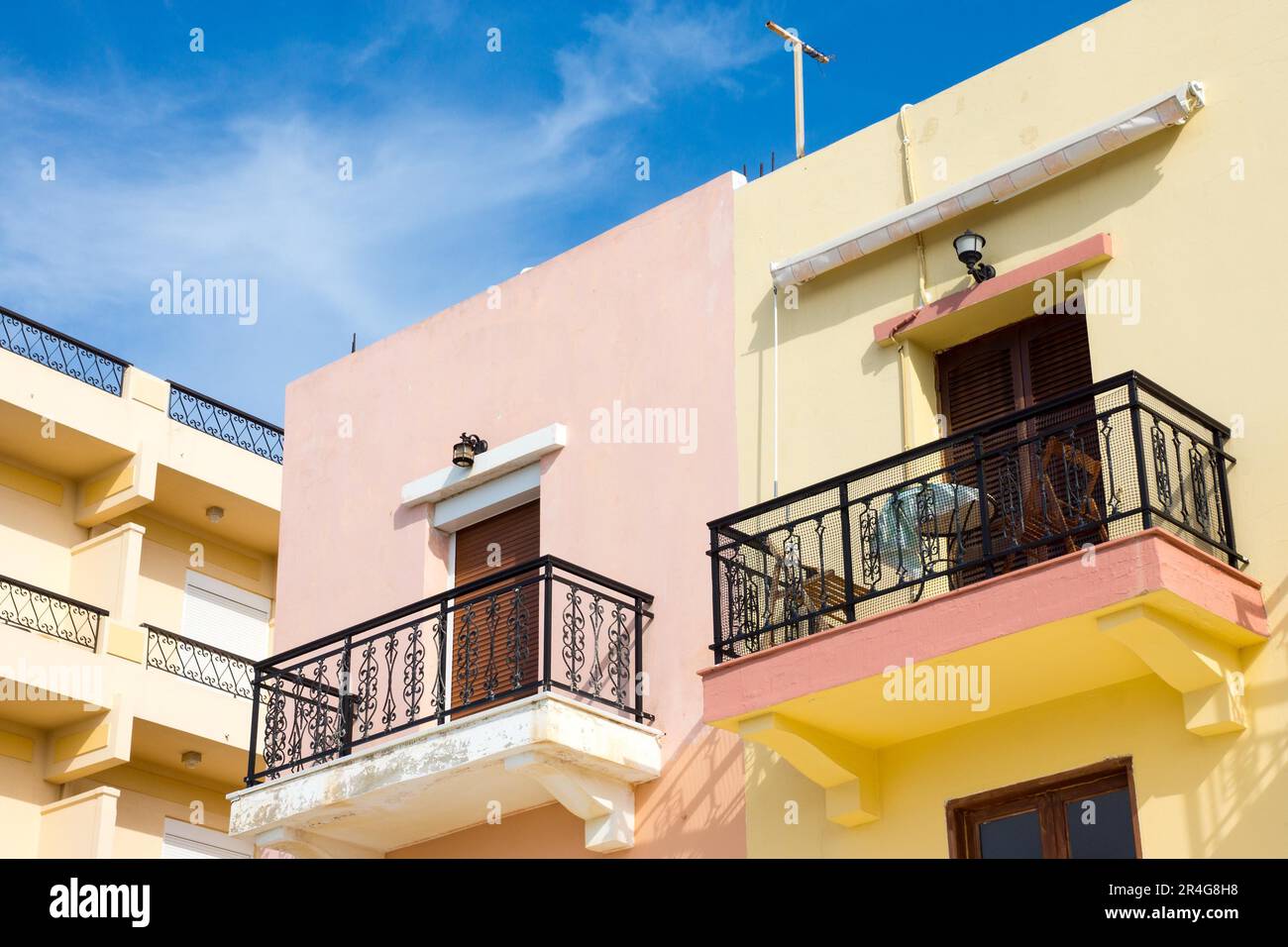Colourful holiday flats seen in Chania on Crete Stock Photo - Alamy