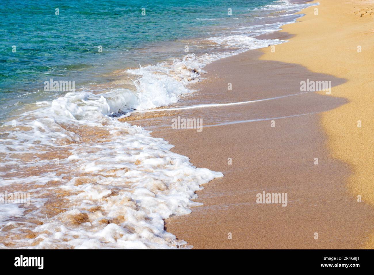 Beach with surf in Crete Stock Photo - Alamy