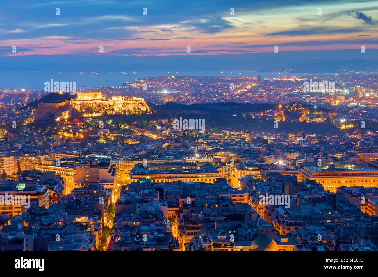 View over Athens with the Acropolis at night Stock Photo - Alamy