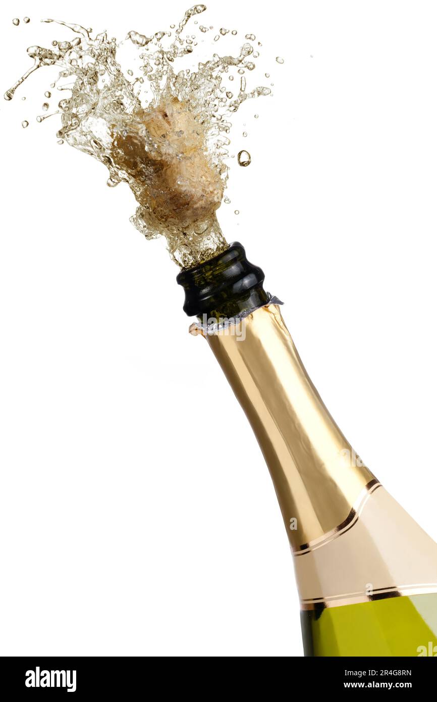 bottle of champagne popping its cork and splashing Stock Photo - Alamy