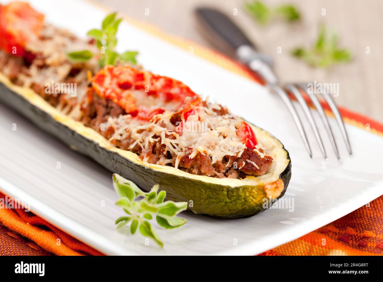 Zucchini halves stuffed with minced meat and vegetable Stock Photo - Alamy