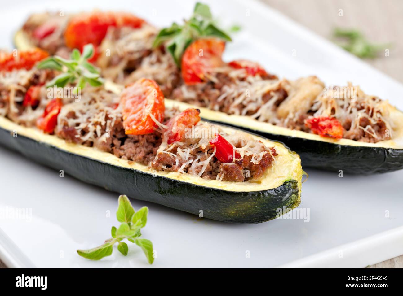 Zucchini halves stuffed with minced meat and vegetable Stock Photo - Alamy