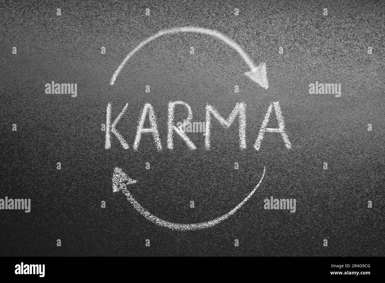Drawn circle and word Karma written on blackboard Stock Photo - Alamy