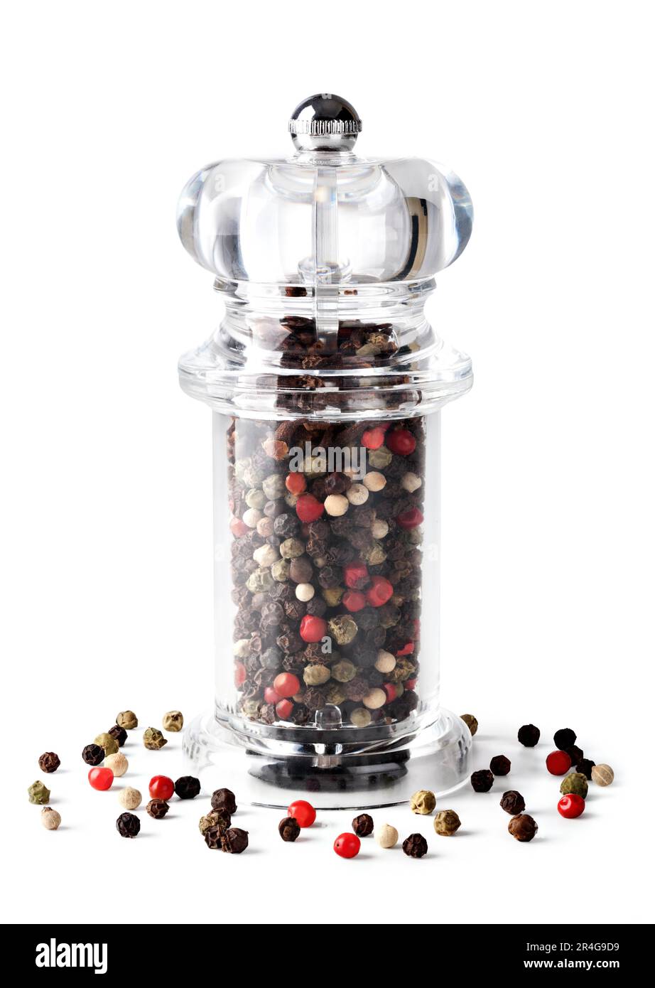 Colored Peppers Mix and pepper grinder on white background Stock Photo ...