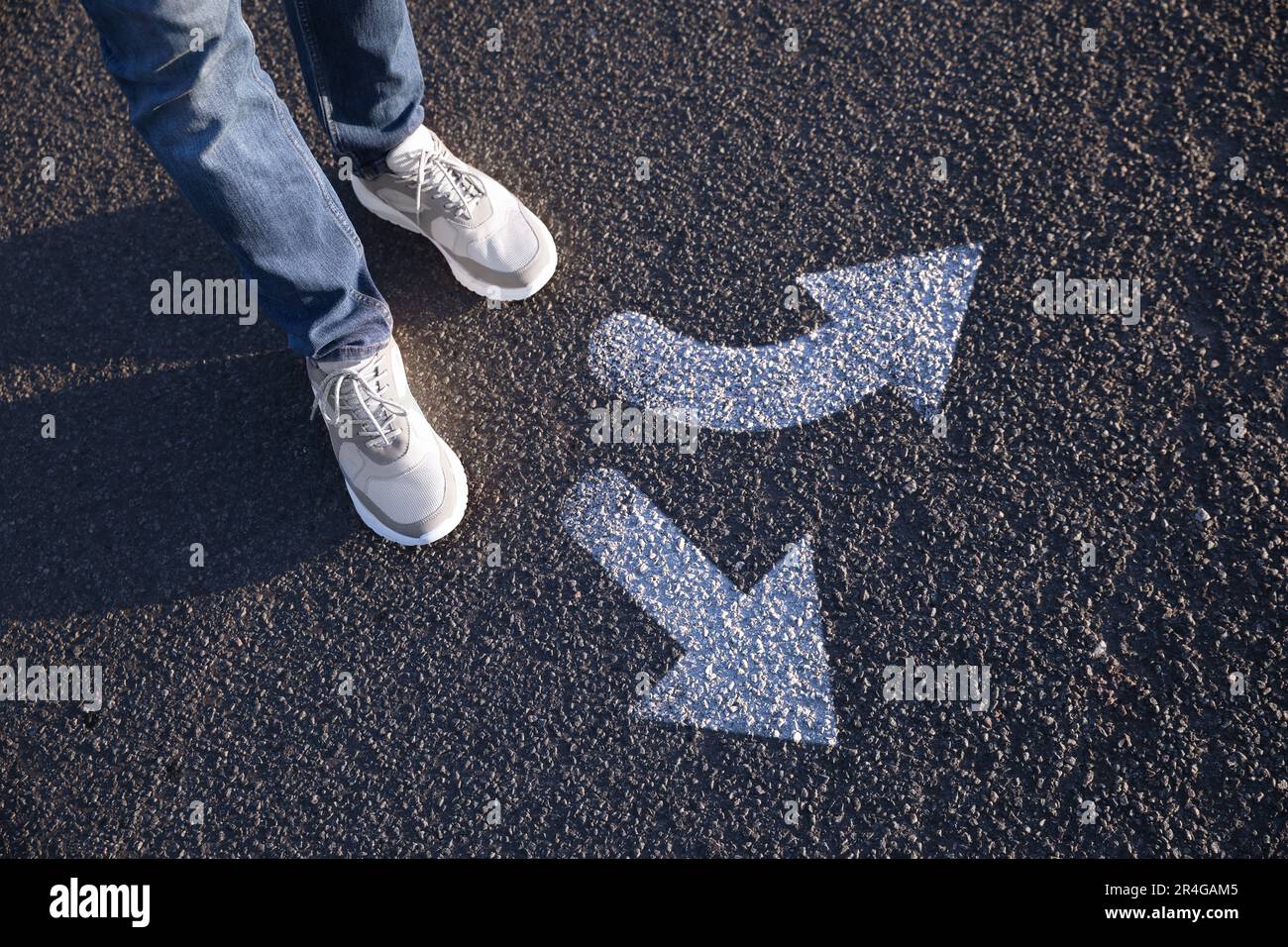 Arrows on pavement feet hi-res stock photography and images - Alamy