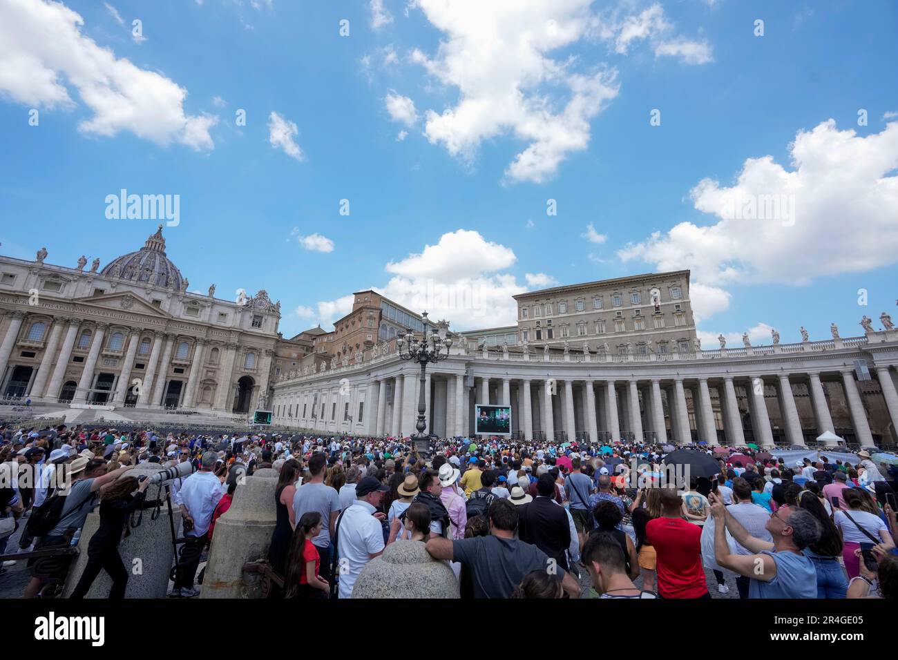 People crowd St. Peter's Square at the Vatican as Pope Francis delivers ...