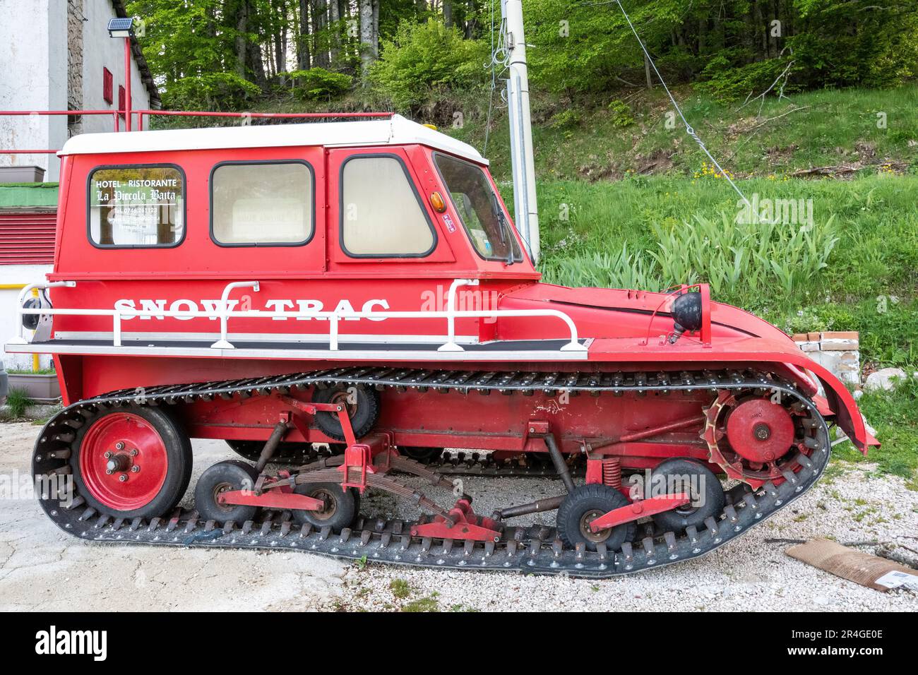 Snow Trac, red tracked vehicle or snowcat designed to drive on snow ...