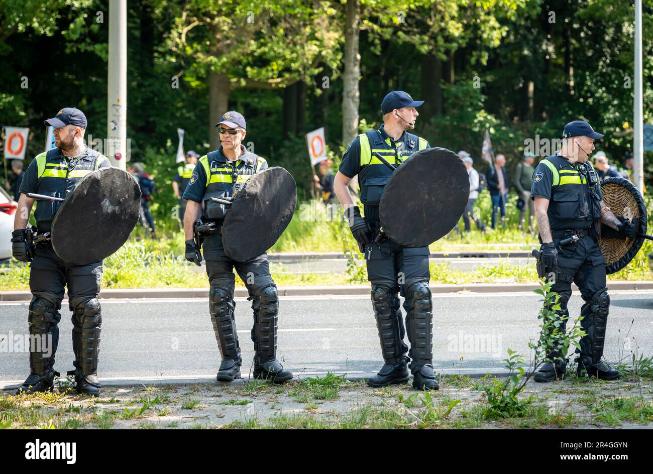 The Hague, The Netherlands, 27.05.2023, Dutch policemen by the road ...