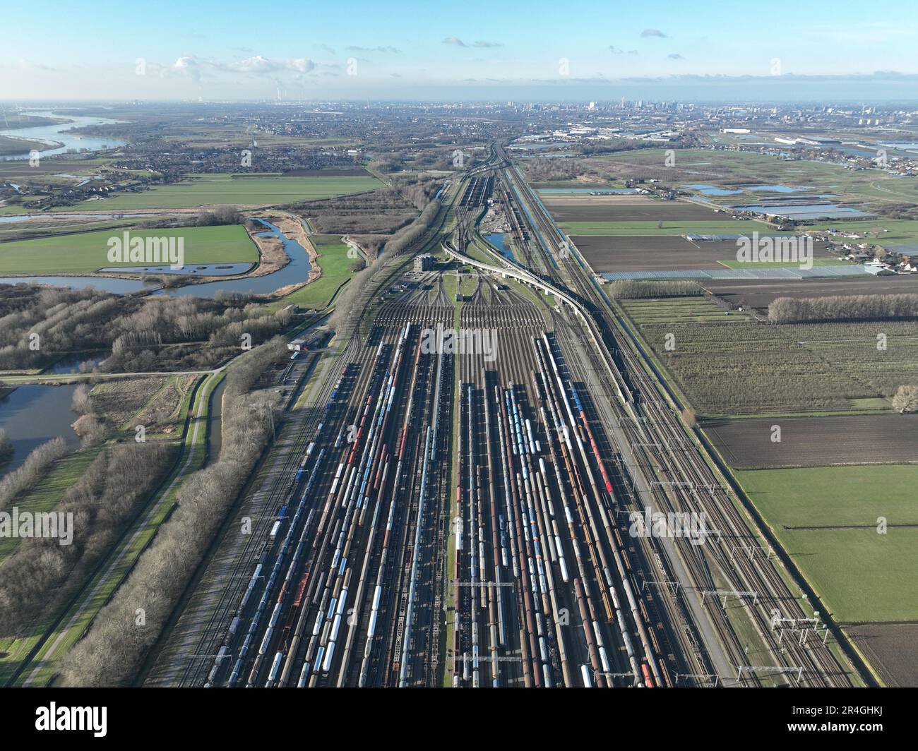 Aerial drone video showcasing the inner workings of a bustling railway ...