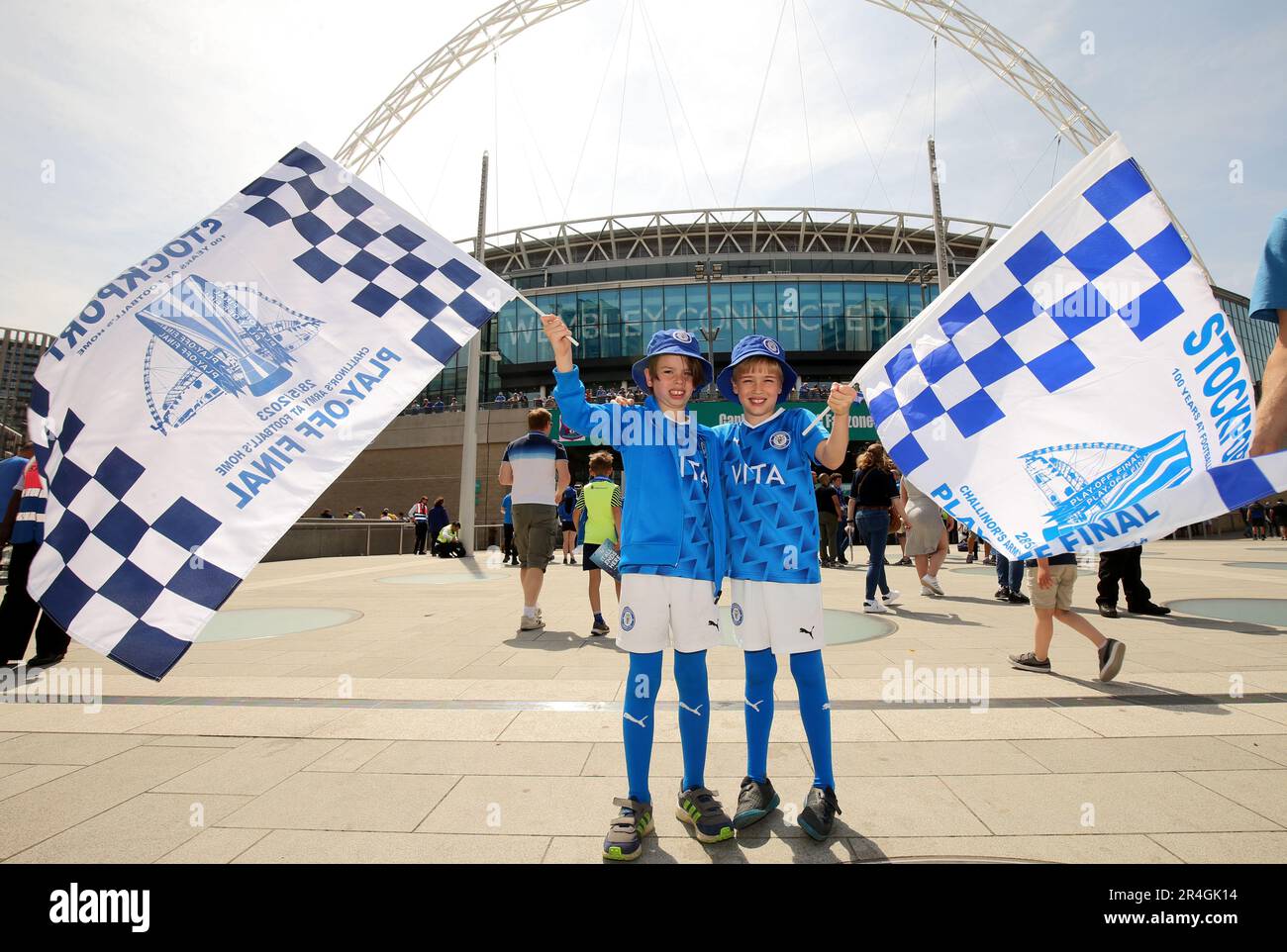 Stockport County fans with flags pose for a photo on Wembley Way ahead ...