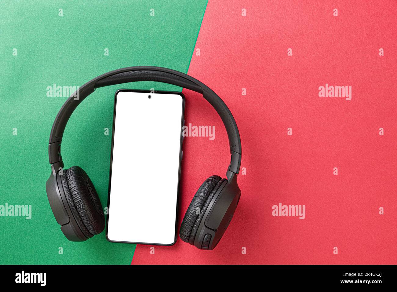 Wireless headphones, modern headphones on the table. Headphones and ...