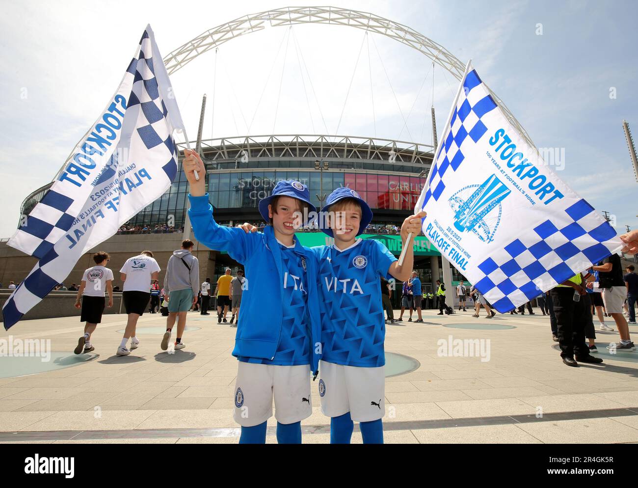 Stockport County fans with flags pose for a photo on Wembley Way ahead ...