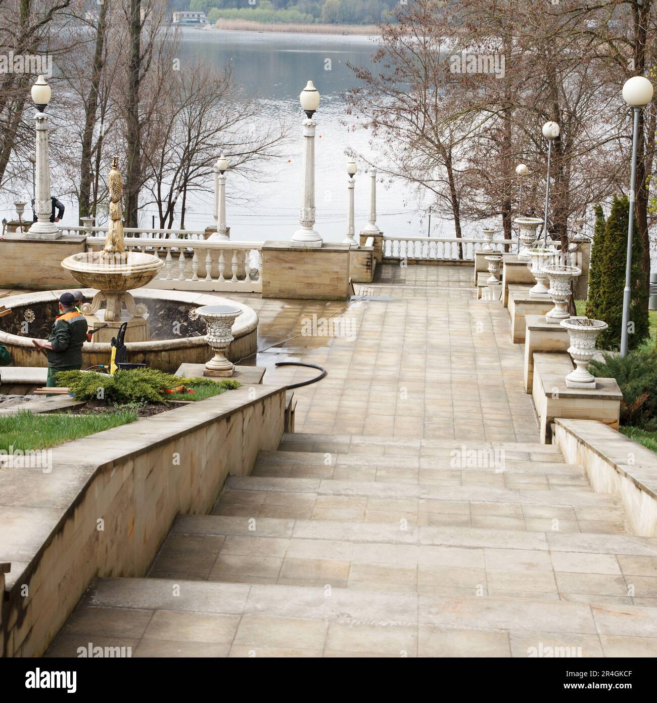 Communal professional workers carry out spring cleaning of fountains ...