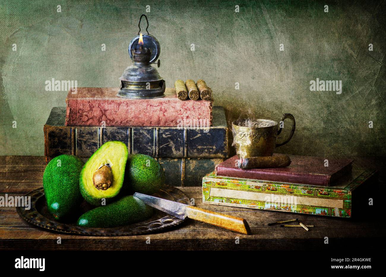 Still Life with fresh avocados placed in vintage tray with old knife ...