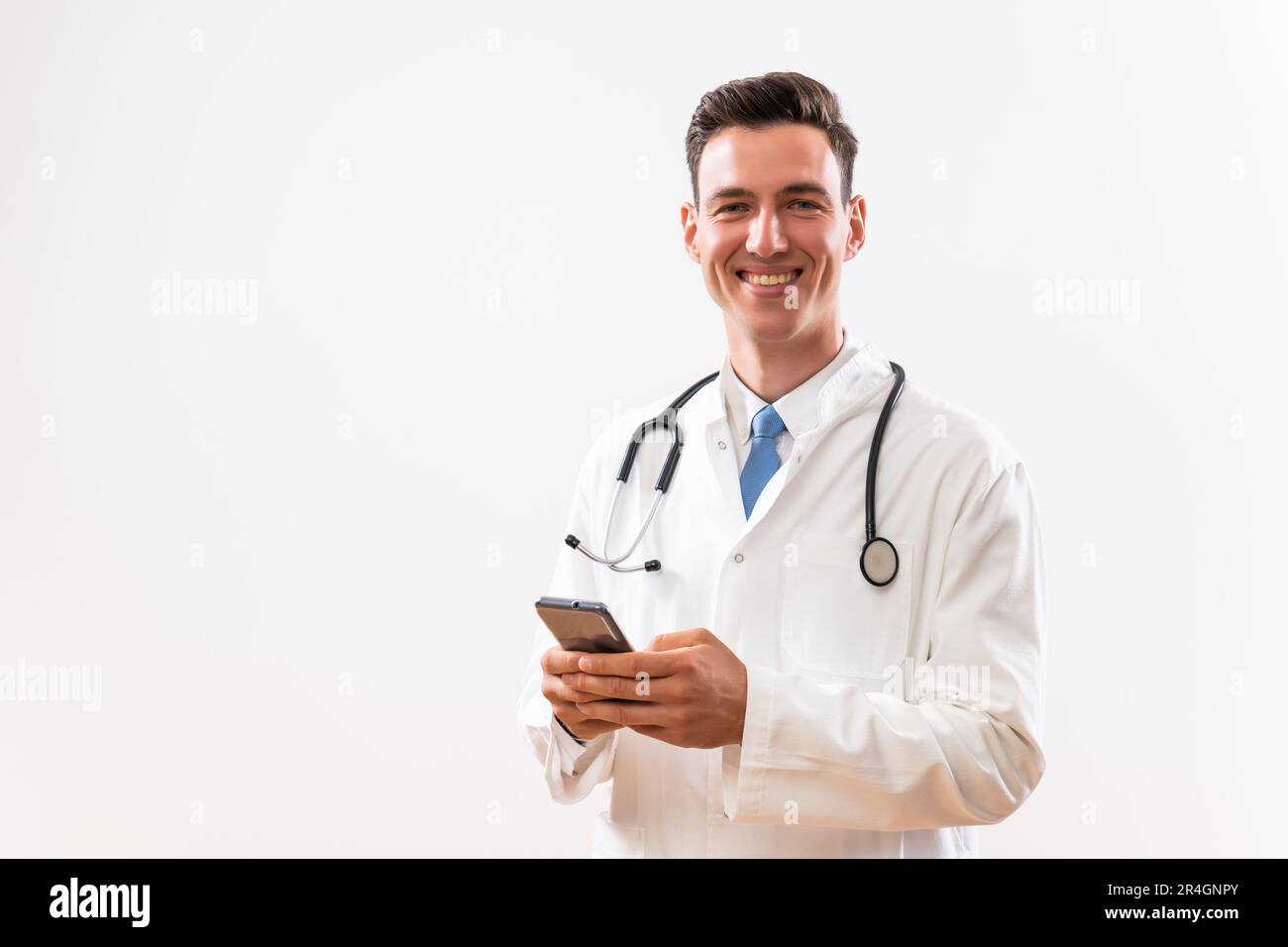 Paramedic doctor using mobile phone hi-res stock photography and images ...