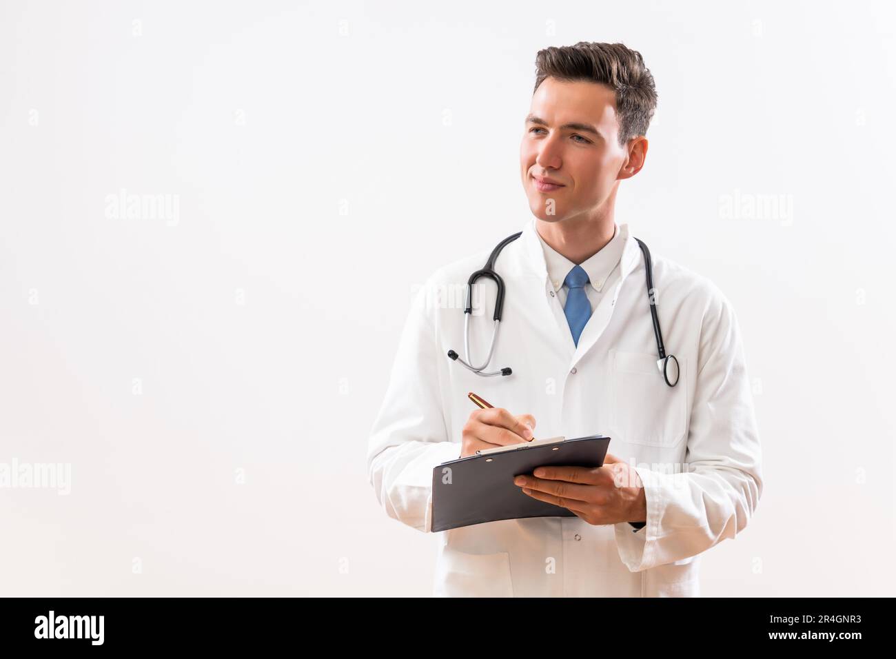Image of doctor writing notes Stock Photo - Alamy