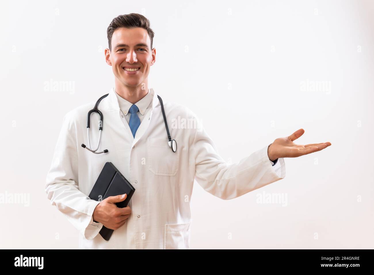 Image of doctor showing welcome gesture. and holding digital tablet ...