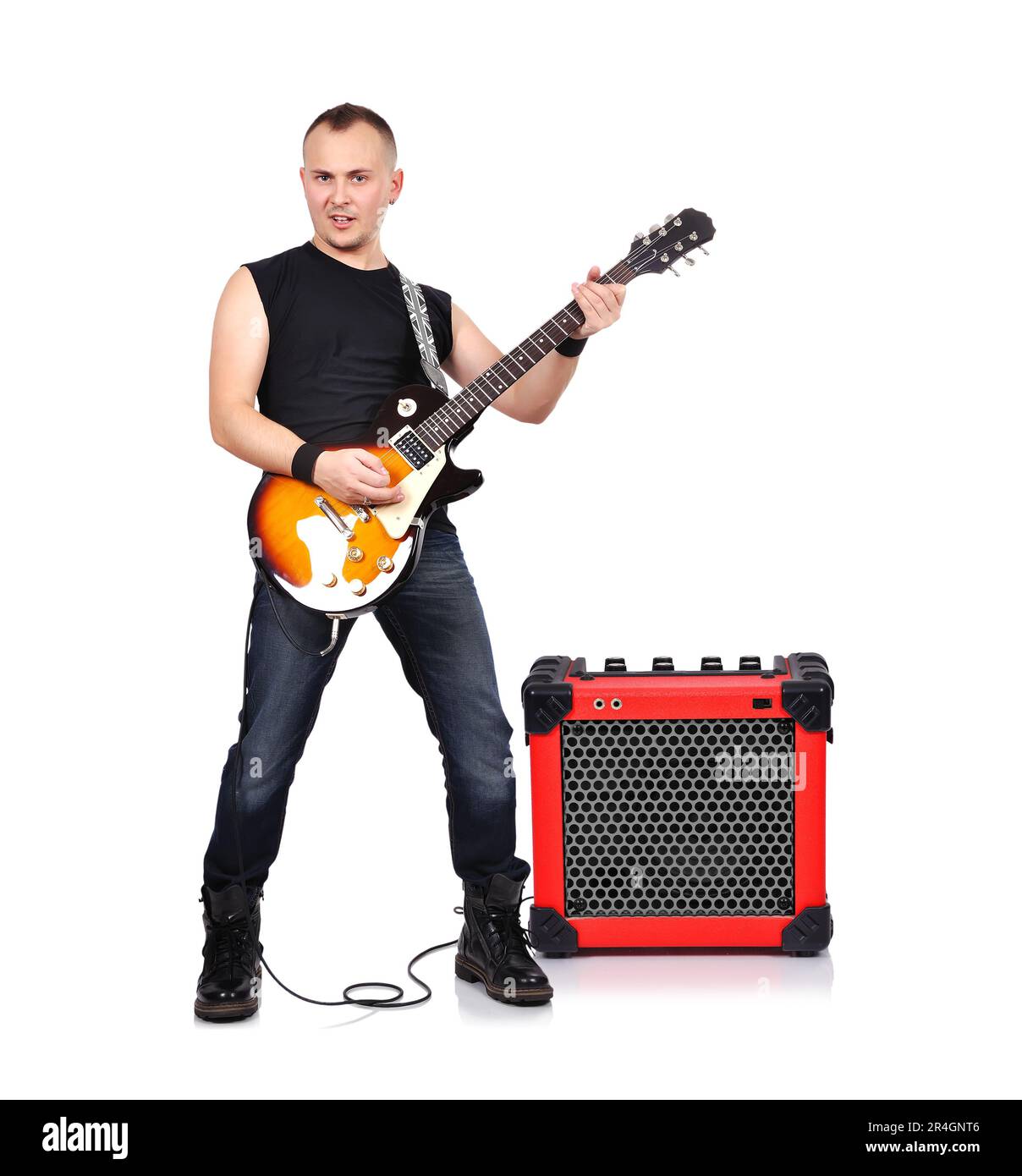 rocker with electrical guitar and guitar combo Stock Photo - Alamy