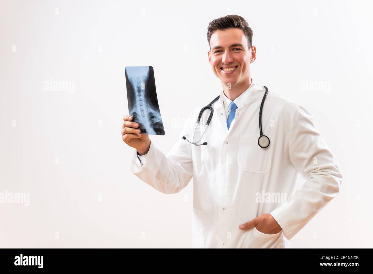 Portrait of doctor doctor holding x-ray image Stock Photo - Alamy