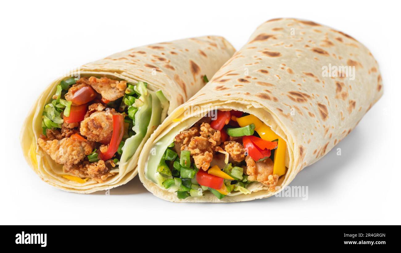 Tortilla wrap with fried chicken meat and vegetables isolated on white ...