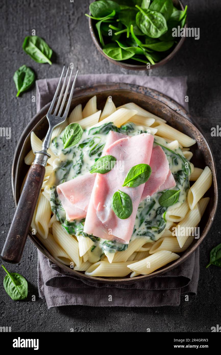 Delicious and fresh pasta with spinach and bechamel sauce. Classic ...