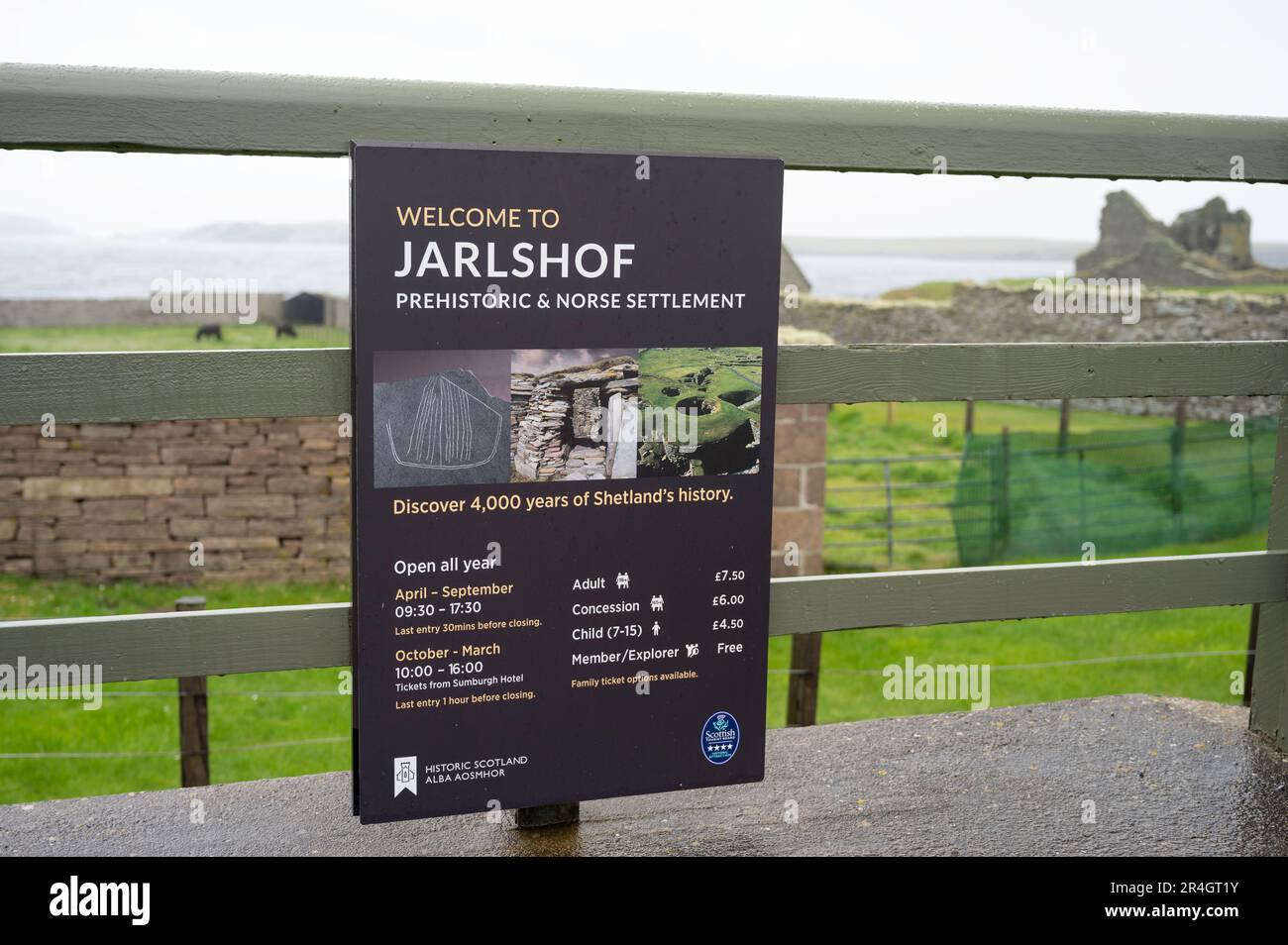 Sign for tourist site of Jarlshof on Shetland, blurred background of ...