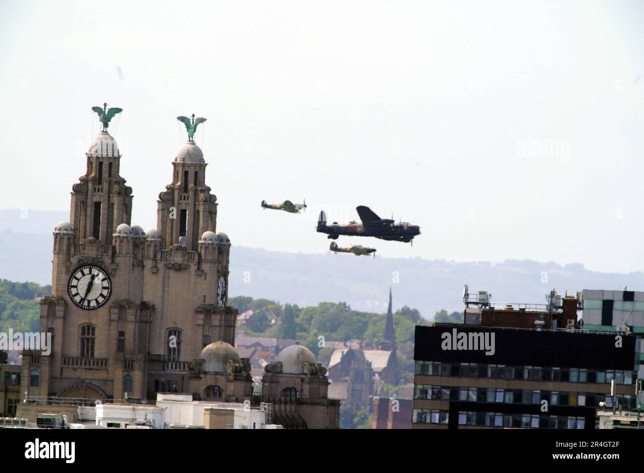A Lancaster Bomber, Spitfire and Hurricane flypast over the Royal Liver ...
