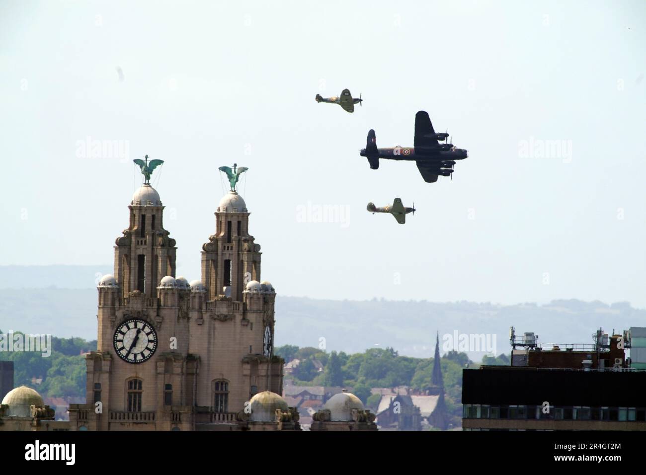 A Lancaster Bomber, Spitfire and Hurricane flypast over the Royal Liver ...